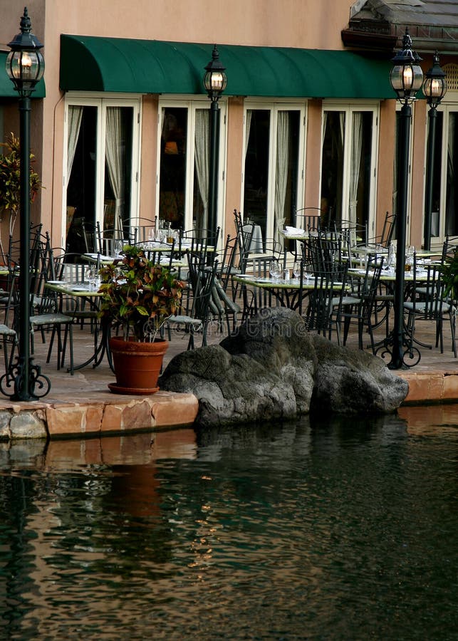 Outside Cafe on Waters Edge Stock Photo - Image of edge, reflection ...