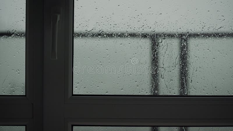 Outside is Raining and Inside View of the Window Frame and Glass. Close ...