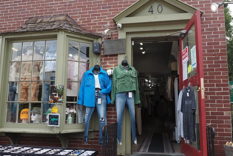 The Outside of this Store is Decorated with Many Objects and Clothing ...