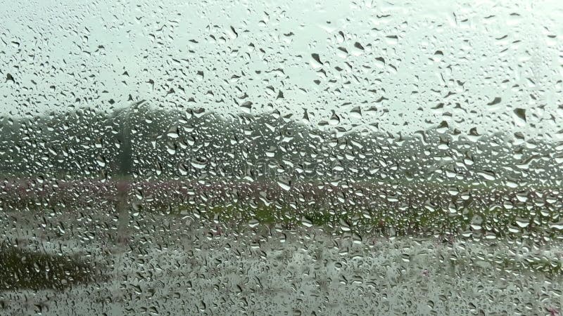 Droplets on windscreen stock video. Video of inside - 342057287