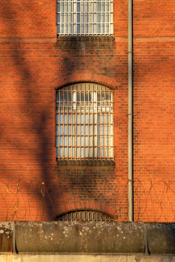 The Outside View of an Old Jail Stock Photo - Image of bars, safe: 94165024