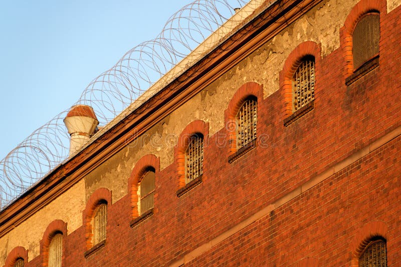 The Outside View of an Old Jail Stock Photo - Image of attachment ...