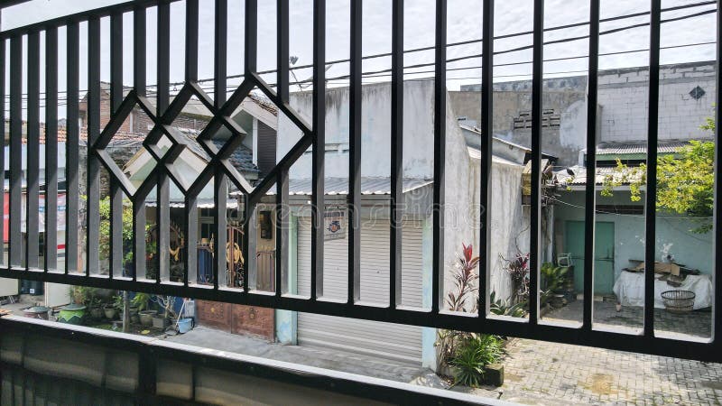 The Outside View Seen from the Black Fence of the House Stock Photo ...