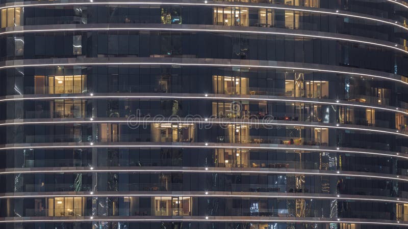Outside View of Windows in Apartments of a High Class Building at Night ...