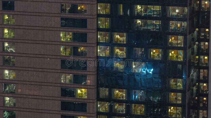 Outside View of Windows in Apartments of a High Class Building at Night ...