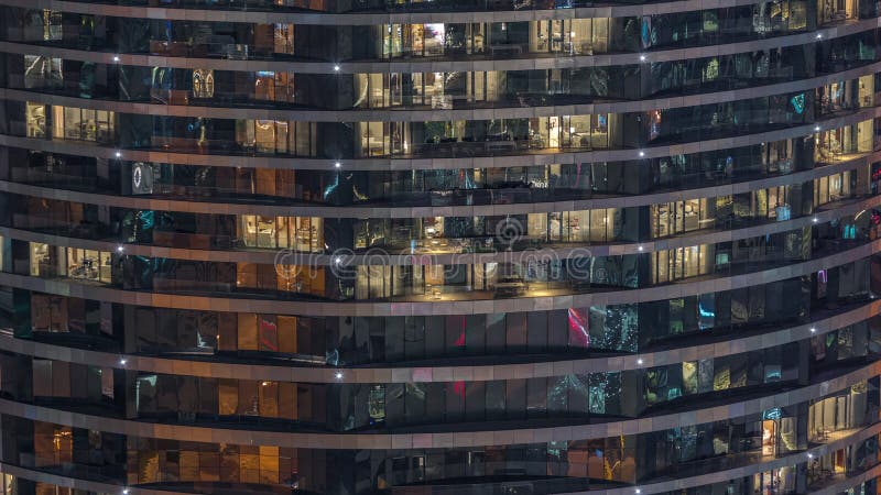 Outside View of Windows in Apartments of a High Class Building at Night ...
