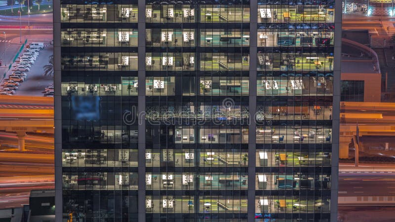 Outside View of Windows in Offices of a High Class Building at Night ...