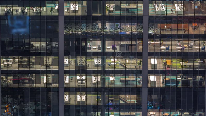 Outside View of Windows in Offices of a High Class Building at Night ...