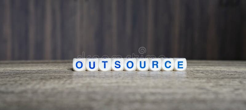 Outsource Boggle Word Cubes on Dark Background Stock Image - Image of ...