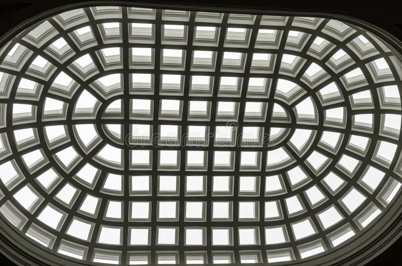 Oval-shaped Glass Ceiling Featuring a Grid of Square Panels, Forming a ...
