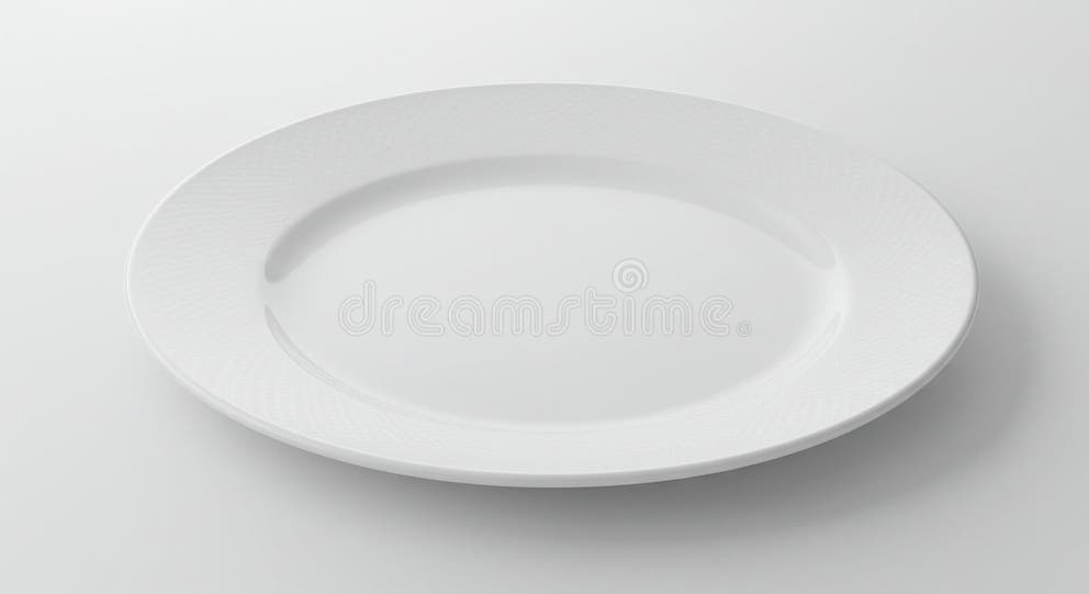 Oval White Ceramic Plate on a Plain Surface. the Plate Features a ...