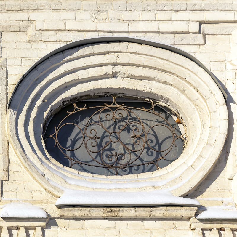 Oval window with grating stock photo. Image of fancy - 209317662