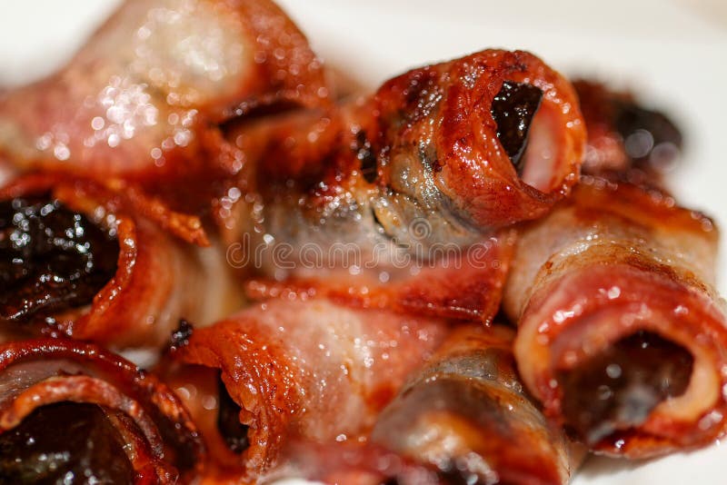 In the Oven Baked Bacon Filled with Plums Stock Photo - Image of ...