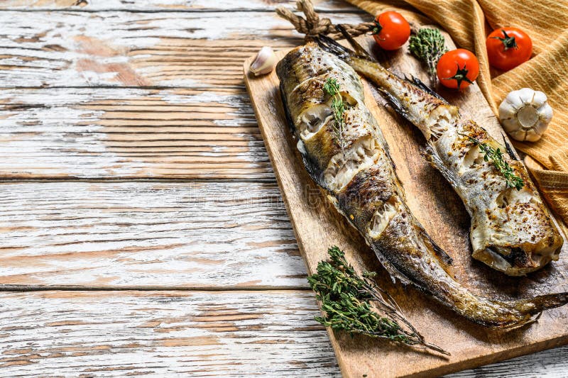 Oven Baked Pollock Cooked in a Savory Marinade. White Background. Top ...