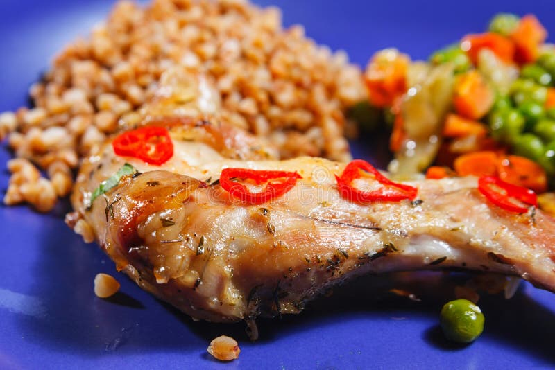 Oven baked rabbit legs stock image. Image of close, healthy - 37943821