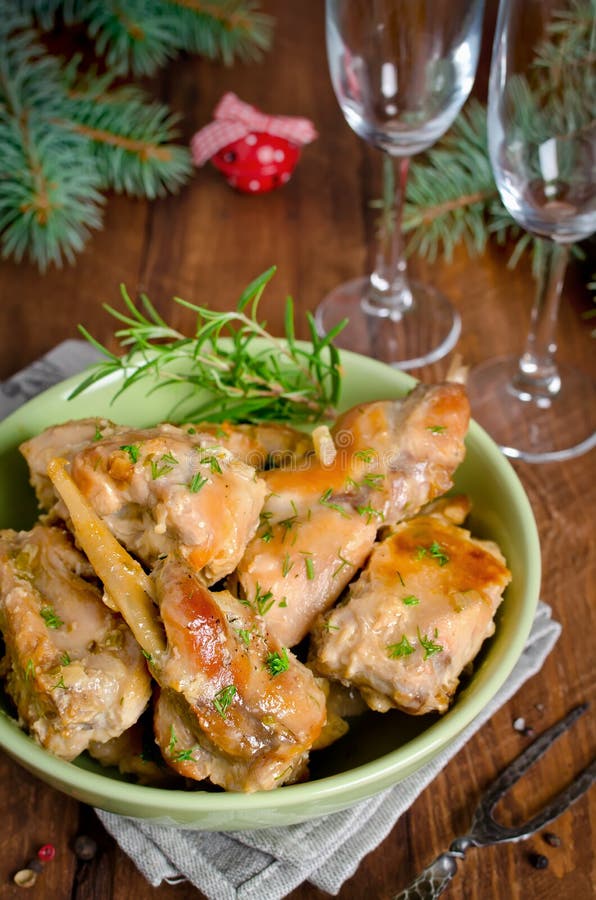 Oven Baked Rabbit Legs with Potatoes and Rosemary Stock Image - Image ...
