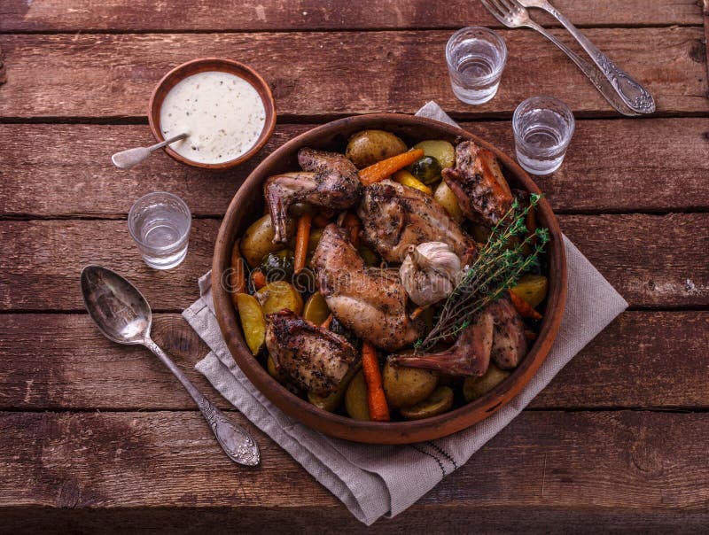Oven Baked Rabbit with Root Vegetables and Herbs, Rustic Style Stock ...