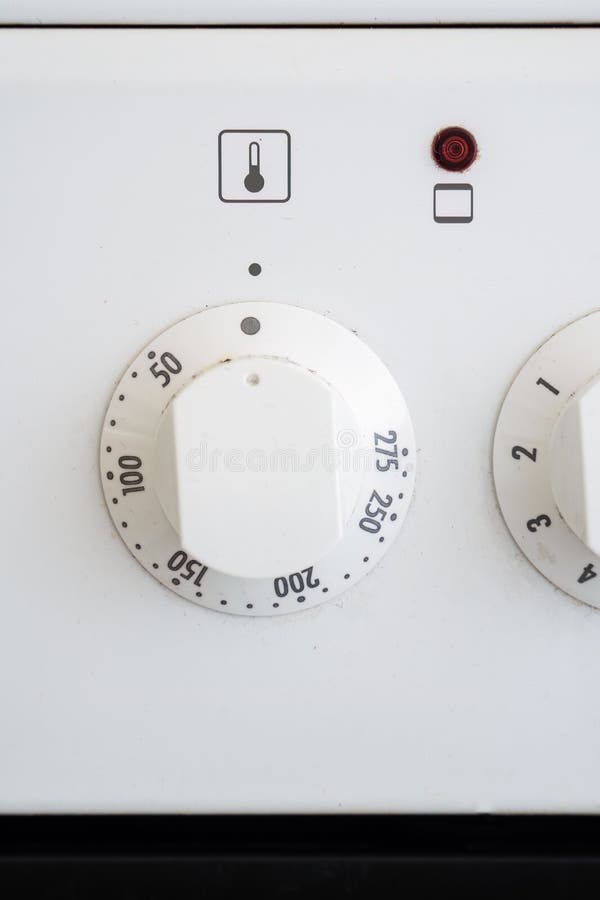 Oven Control Dial and Indicator Light in Close Up Stock Photo - Image ...