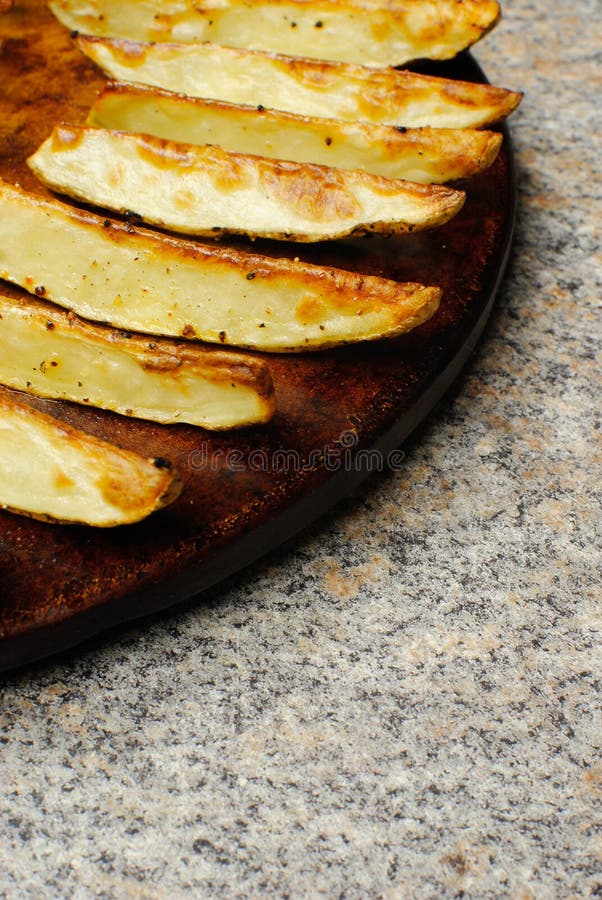 Oven Fries, vertical. stock photo. Image of crispy, wedge - 26549888