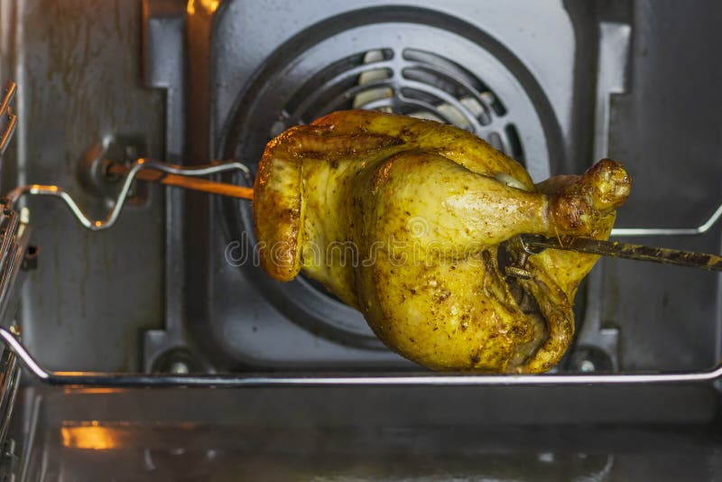 The Pig Rotates on the Spit. Stock Photo - Image of grill, lunch: 103010882