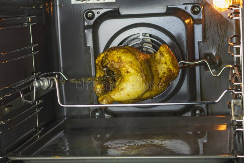 Oven. Grilled Chicken is Cooked on a Spit Stock Image - Image of ...