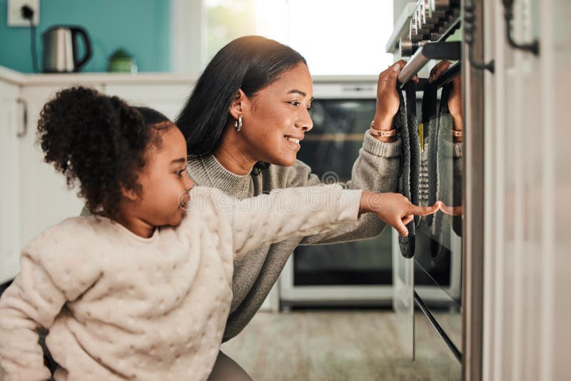 Oven, Learning and Mother Cooking with Child in Kitchen for Development ...