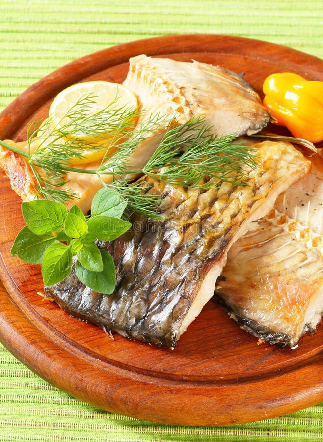 Oven-roasted carp fillets stock photo. Image of oven - 56728922
