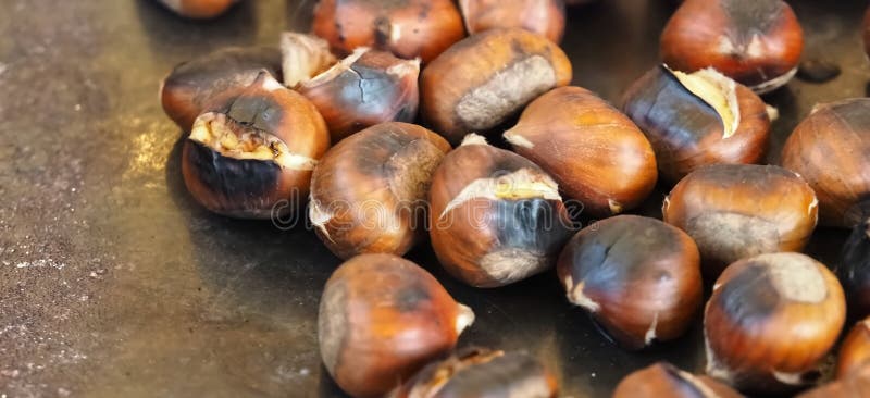 Oven Roasted Chestnuts on a Grill Stock Image - Image of healthy, brown ...