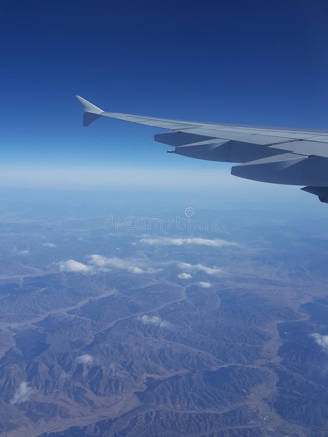 Looking out airplane stock image. Image of groundblue - 118624739