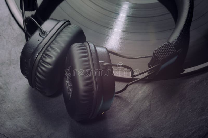 Over or on-ear Headphones on Vinyl Record Stock Photo - Image of song ...