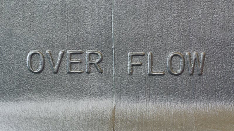 Over Flow Sign Molded on Textured Plastic Surface Stock Photo - Image ...
