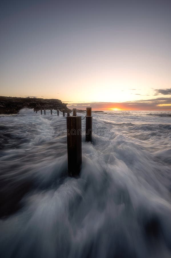 Over Flowing Tidal Pool at Dawn Stock Photo - Image of flow, dawn ...