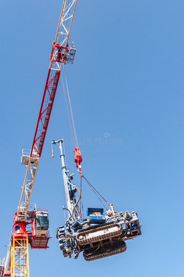 Over Head Crane Lifting Huge Tractor Equipment Stock Image - Image of ...