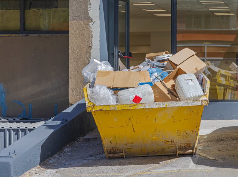A Large Skip Container Filled To the Top with Household Waste Stock ...