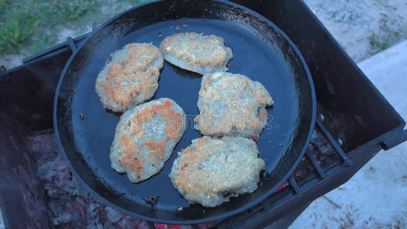 Cooking Potato Pancakes, Cutlets on an Open Fire in a Calm Atmosphere ...