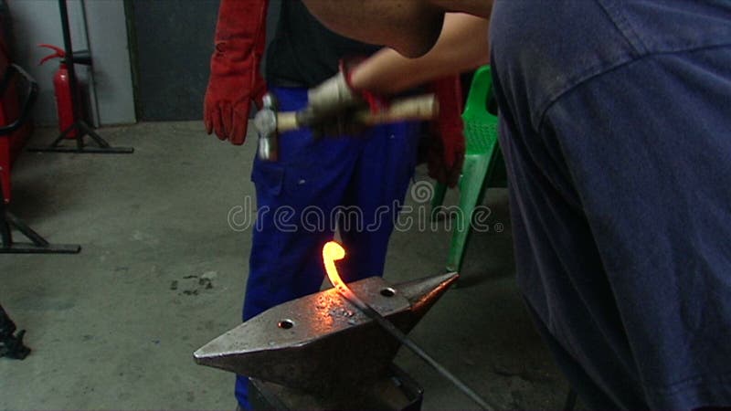 Over Shoulder of Hammer and Anvil Stock Video - Video of creative, hand ...