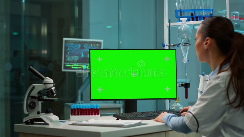 POV Shot of Chemist Using Tablet with Green Screen in Laboratory Stock ...