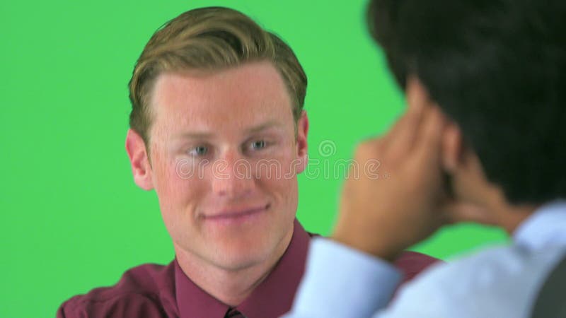 Over the Shoulder of Two Businessmen Talking on Greenscreen Stock Video ...