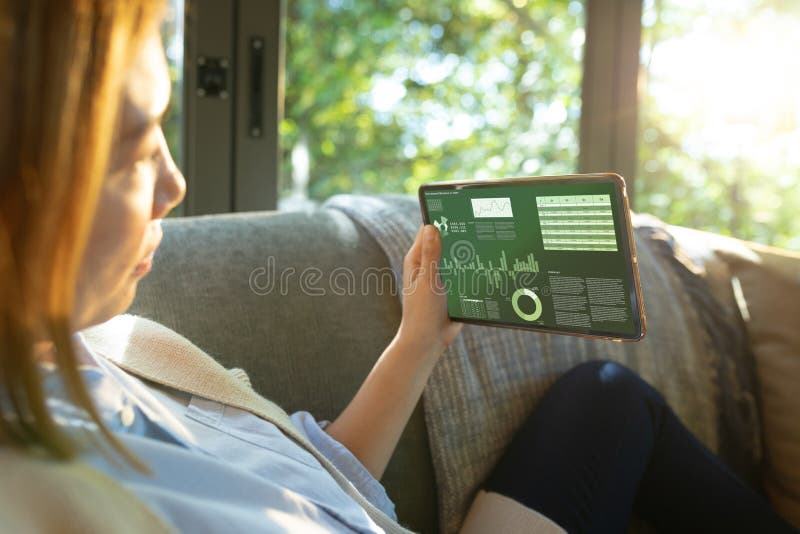 Over Shoulder View of Asian Woman Using Tablet with Data Processing on ...