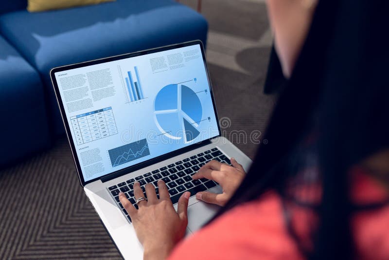Over Shoulder View of Biracial Woman Using Laptop with Data Processing ...