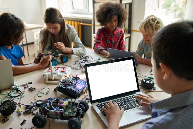 Diverse Schoolkids at Stem Class Building Robot Using Pc with White ...