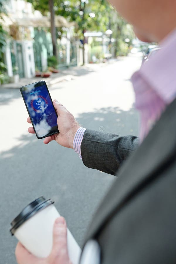 Man Checking Weather Forecast on Phone Stock Photo - Image of adult ...
