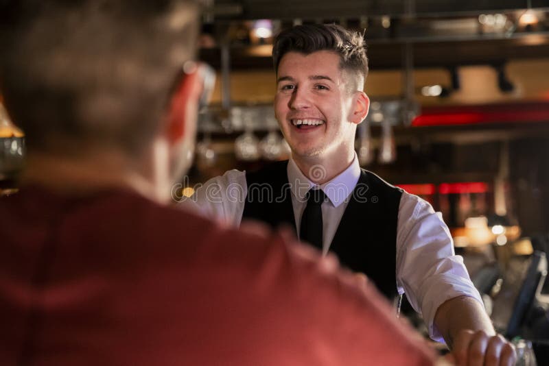 125 Bartender Talking Customer Bar Counter Stock Photos - Free ...