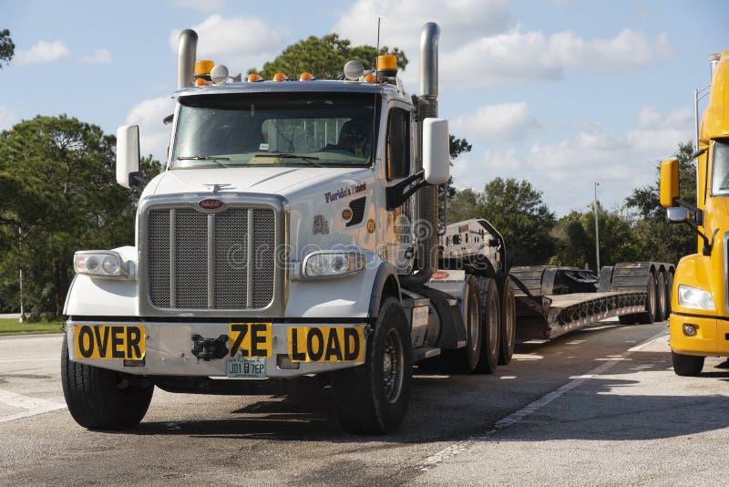 Over Size Load Truck and Low Trailer on a Florida Rest Stop Editorial ...