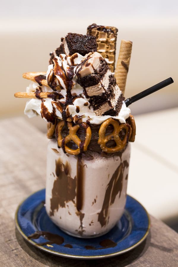 Over the top Milkshake stock image. Image of cream, brownies - 64217591