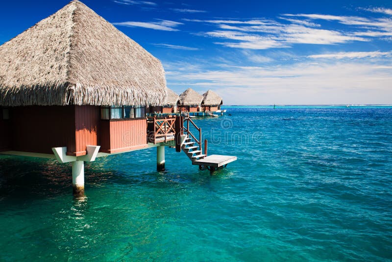 Over Water Bungalow with Steps into Clear Ocean Stock Photo - Image of ...
