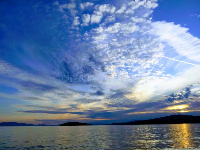 Over yonder stock photo. Image of evening, shore, sunset - 241286768