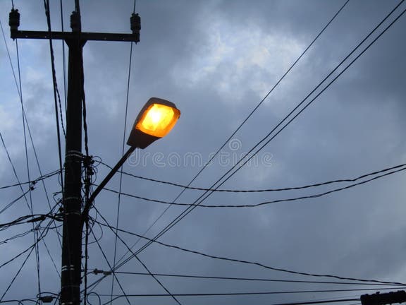 Overcast Clouds and Street Lights Stock Photo - Image of street, cloud ...