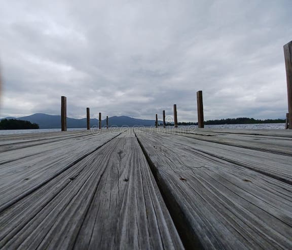 Overcast on the Dock stock image. Image of walkway, horizon - 334470463