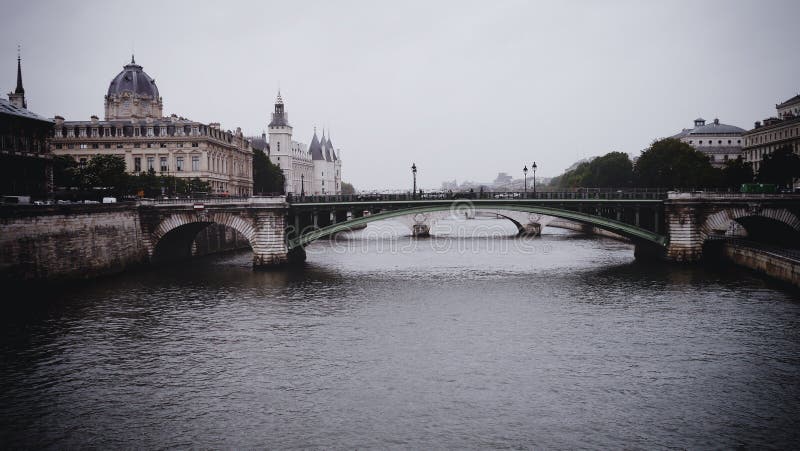 Overcast Paris river stock image. Image of winter, bridge - 53230519